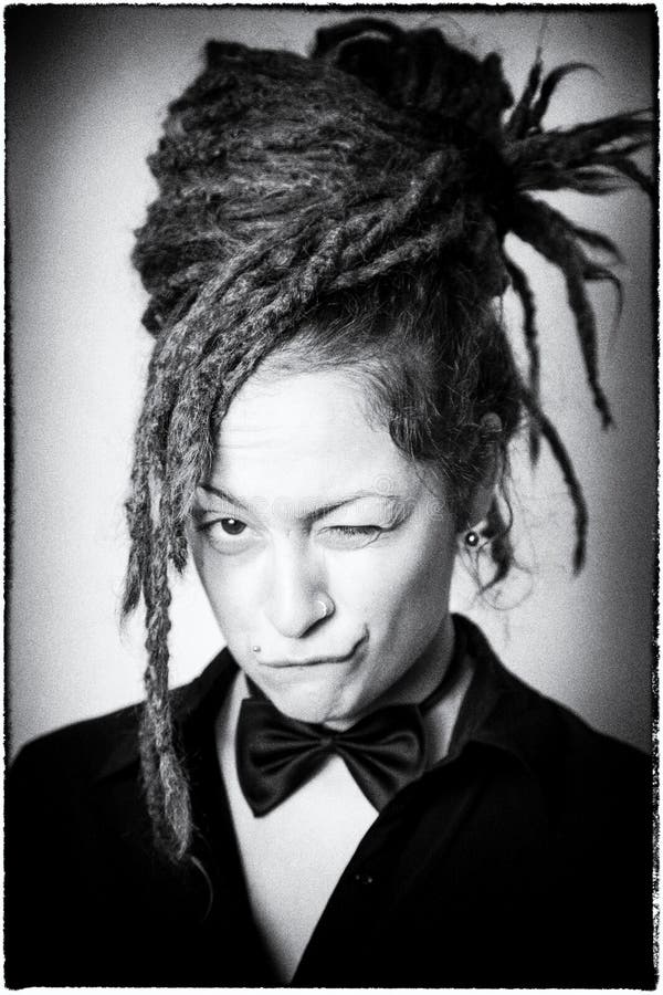 Winking Girl with Dreadlocks and Bow Tie Stock Photo - Image of ...