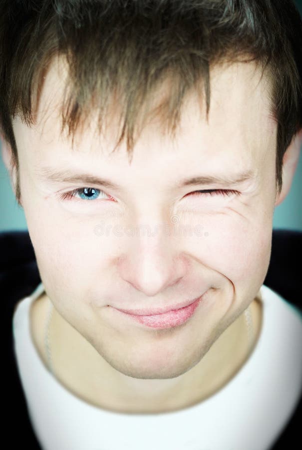 Winking guy stock photo. Image of casual, funny, laughing - 23077360