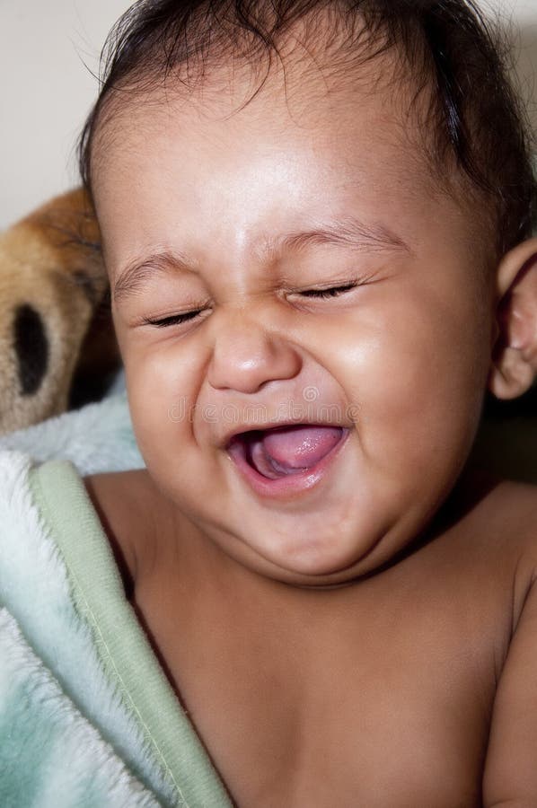 New Born Baby winking stock image. Image of child, closeup - 12496445