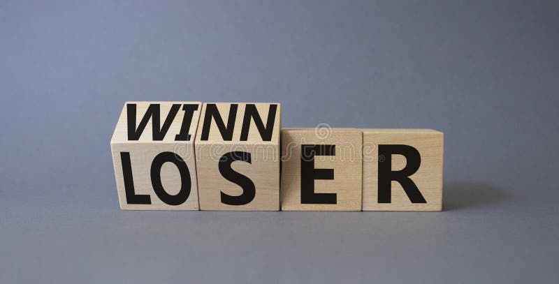 Winner and Loser Symbol. Turned Wooden Cubes with Words Winner and ... Winner and Loser Symbol. Turned Wooden Cubes with Words Winner and ...