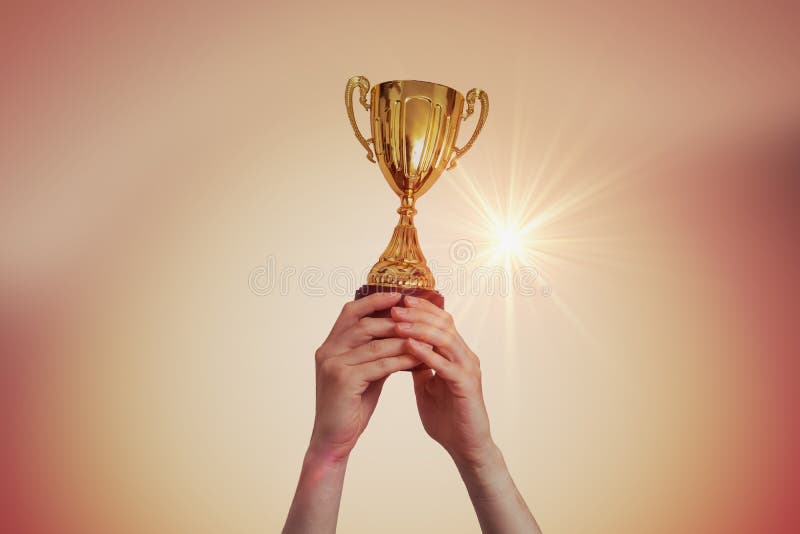 Raised Hands of a Man are Holding Trophy. Isolated on White. Stock ...