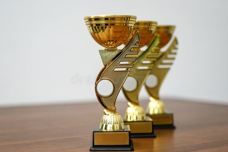 Winners cups on the table stock image. Image of white - 176849915