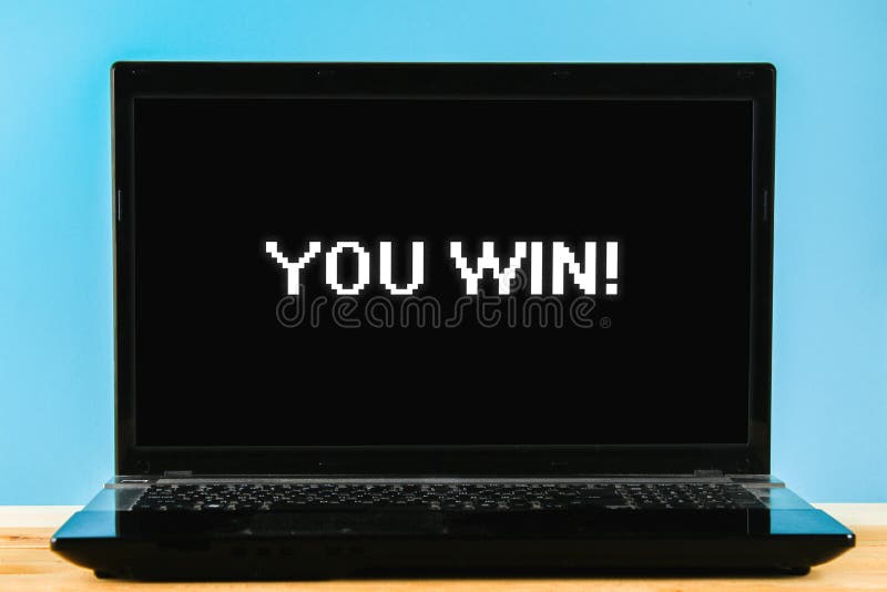 Winning a Computer Game. Laptop on the Table. Stock Image - Image of ...