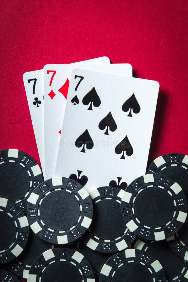 The Winning Poker Combination is Three Kind or Set. Chips and Cards on ...