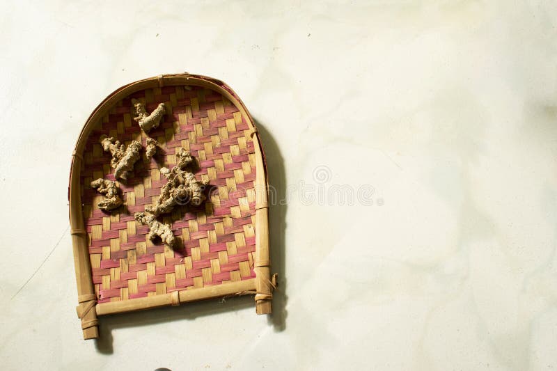 Winnowing Fan Made of Bamboo Slips with Pieces of Ginger on it Stock ...