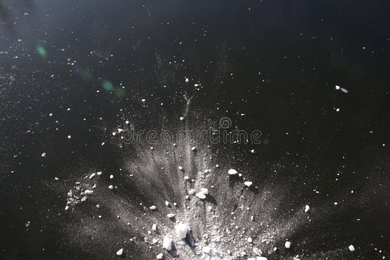 Winter Abstract Background. Snow Hit the Ice with a Mighty Splash. the ...