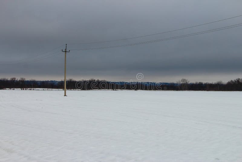 Winter Agricultural Field in Snow and Clouds in the Sky Stock Image ...