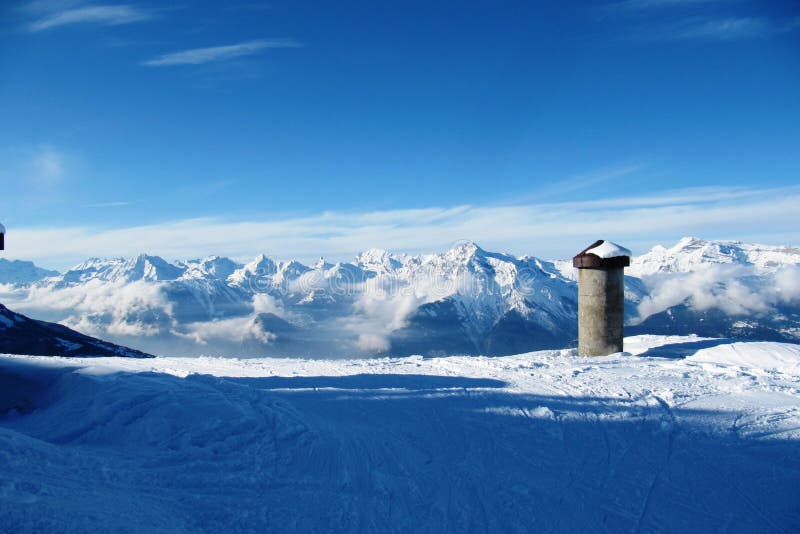 Winter Alpine Mountain Scene Under a Blue Sky Stock Image - Image of ...
