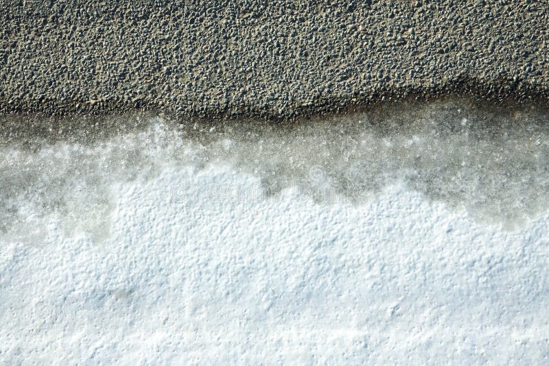 Winter Asphalt Road Covered Ice Crust. Snow Covered Driveway Stock ...