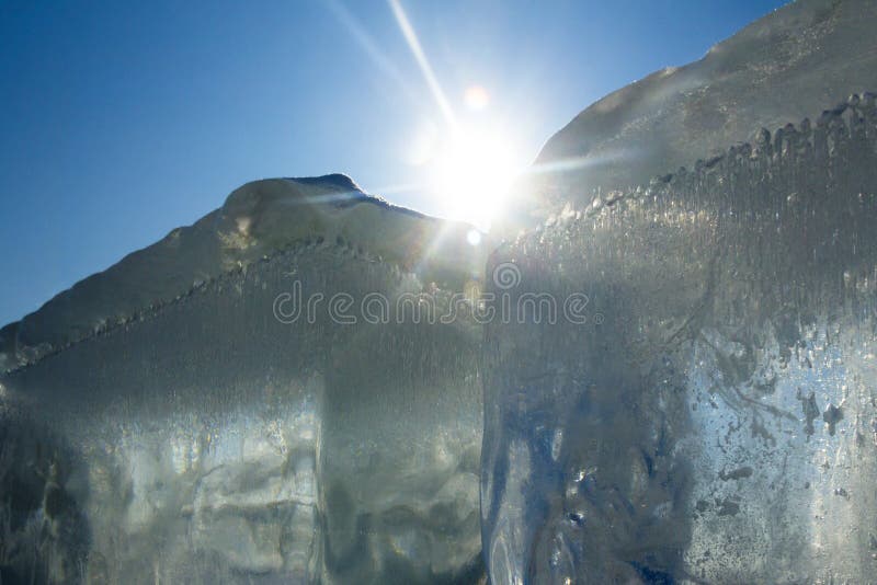 Winter Background. the Sun`s Rays Shine Behind the Ice Blocks. Stock ...