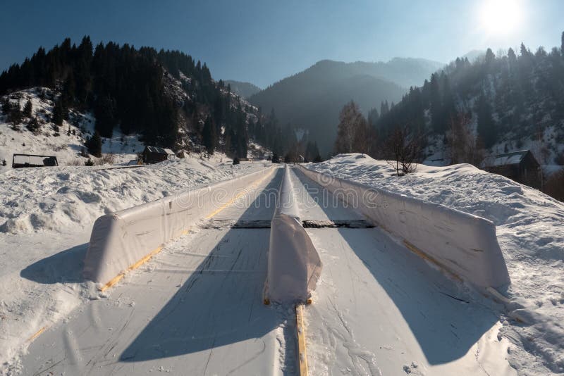 Winter Balloon Slides with Mountain Backdrop in the Stunning Winter ...