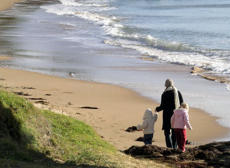 Winter Beach Walk stock image. Image of mother, walk, winter - 55153
