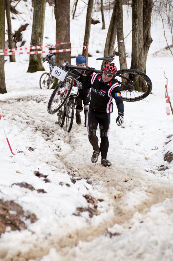 Ice Biking on the hills editorial photo. Image of cyclist - 83760616