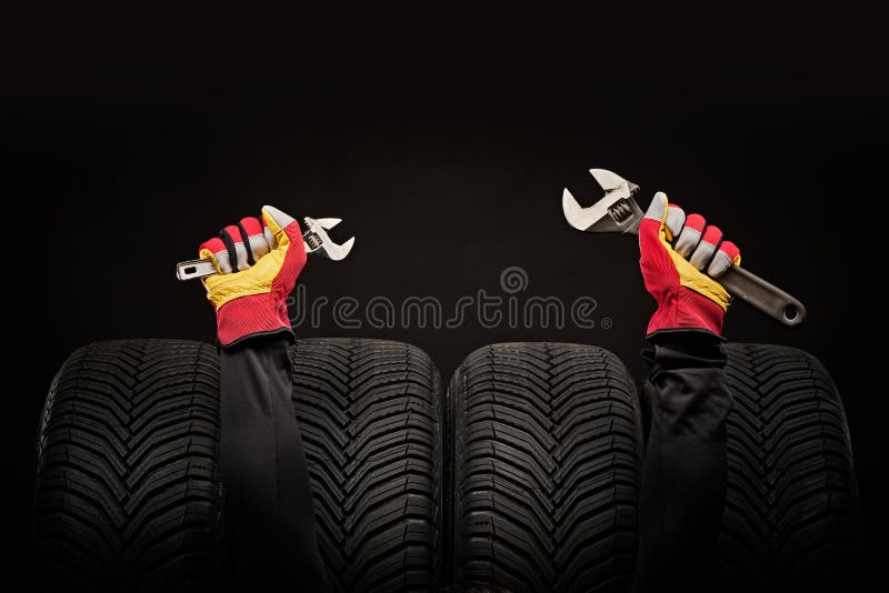 Winter Car Tires Service and Hands of Mechanic with Wrench, Screwdriver ...