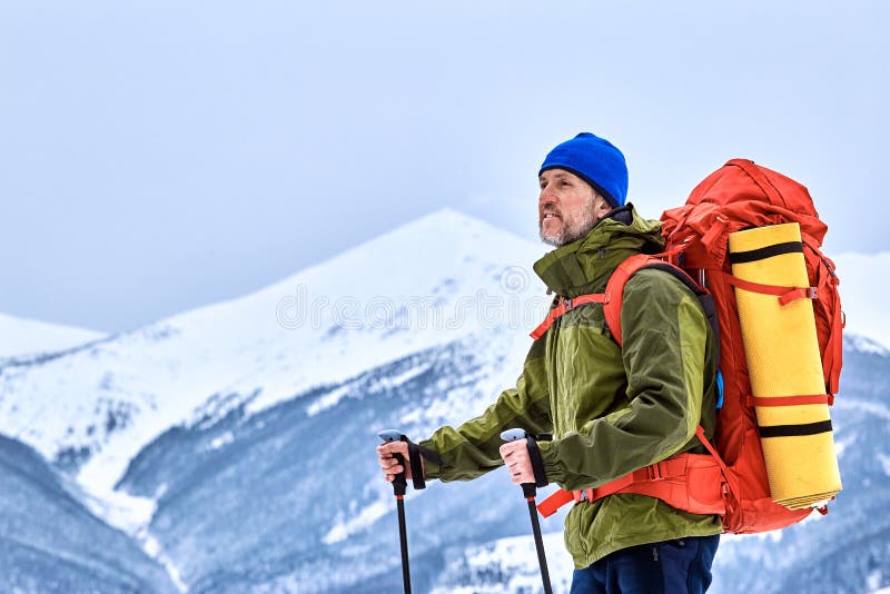 Winter Climb To the Top of the Mountain with a Backpack. Stock Photo ...