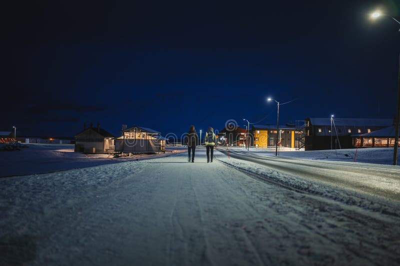 Winter Evening Walk: Longyearbyen Under the Night Sky Stock Image ...