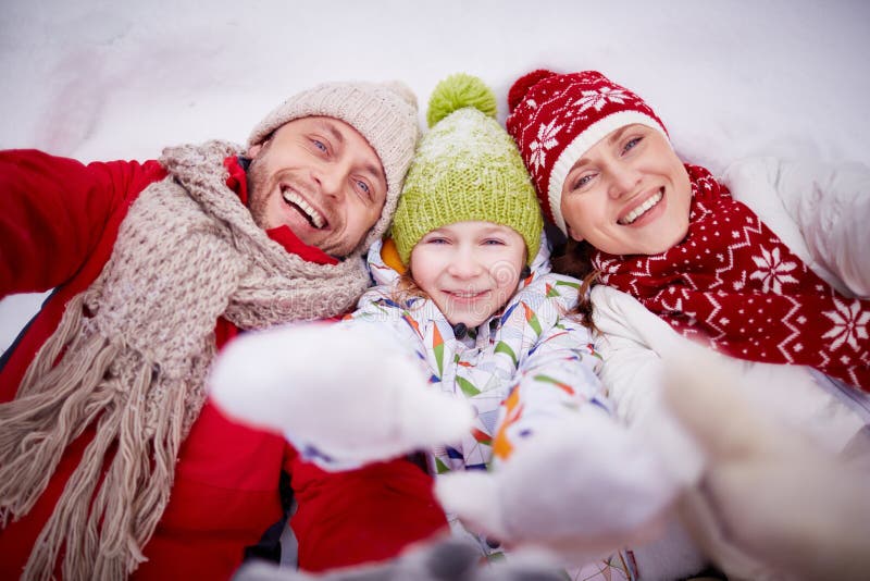 Family on snow stock photo. Image of season, line, expression - 35318764
