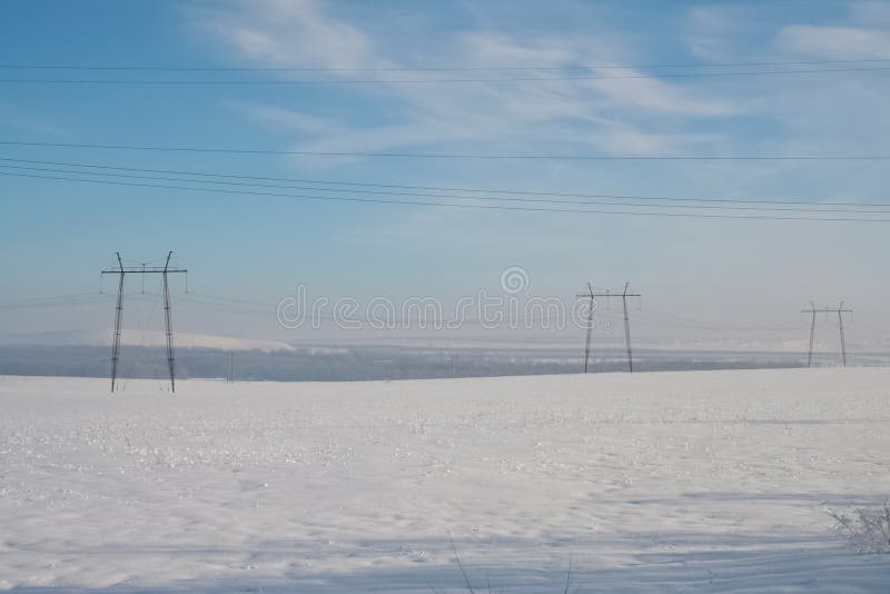 Winter field stock photo. Image of nature, snow, cable - 66764302
