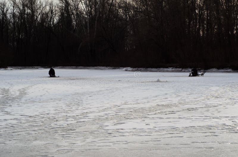 Winter Fishing on a Frozen River Stock Image - Image of cool, frozen ...