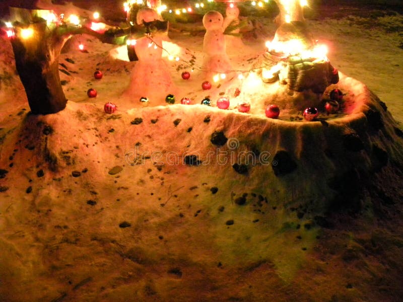 Winter Fun Including Christmas Lights and Snowmen Stock Photo - Image ...