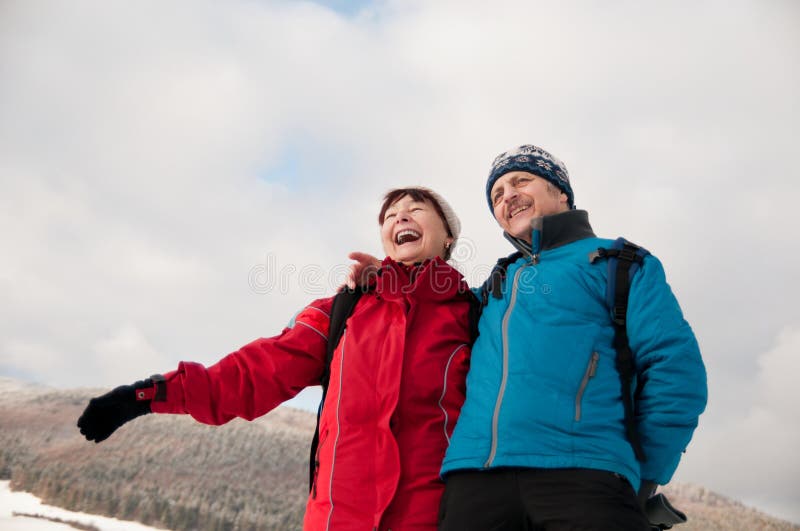 Winter Fun - Senior Retired Couple in Snow Stock Image - Image of ...