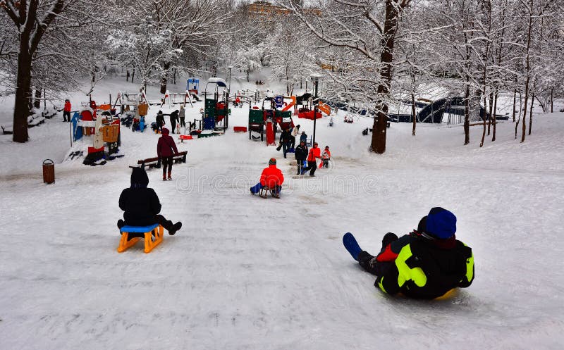 Winter Fun - Sledding editorial stock image. Image of mountain - 48430469