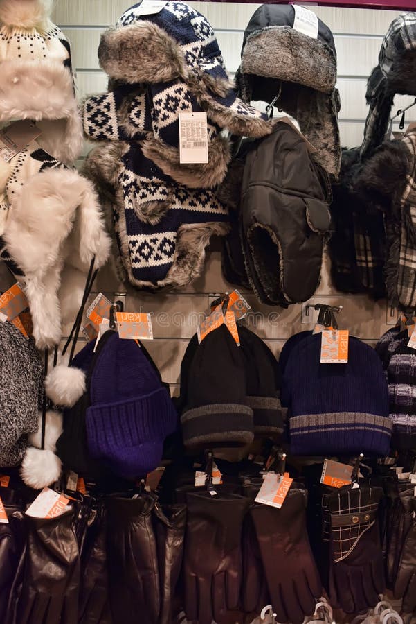 Winter hats in the store editorial stock image. Image of retail - 60463839