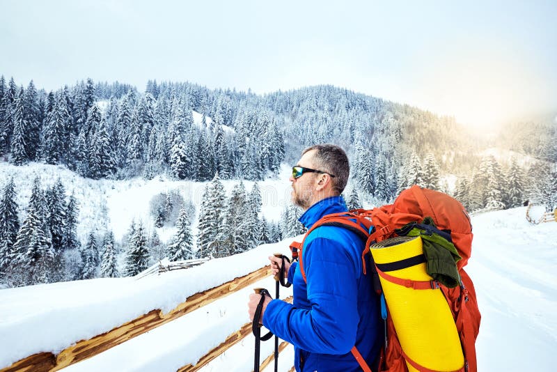 Winter Climb To the Top of the Mountain with a Backpack. Stock Image ...