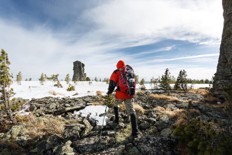 Winter Hiking in the Mountains with a Backpack and Snowshoes Stock ...