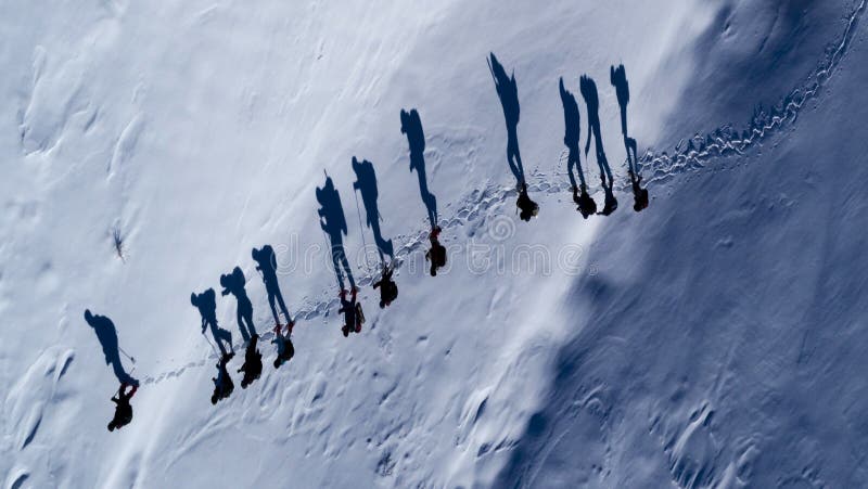 Winter Hiking Team in the Summit Mountains Stock Photo - Image of ...