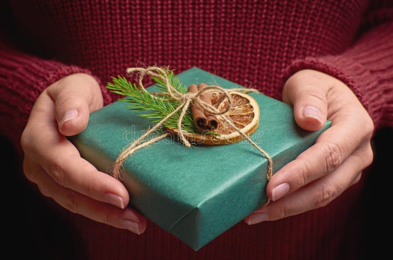Winter Holidays Eco Wrapped Gift or Present Box in Female Hands Stock ...