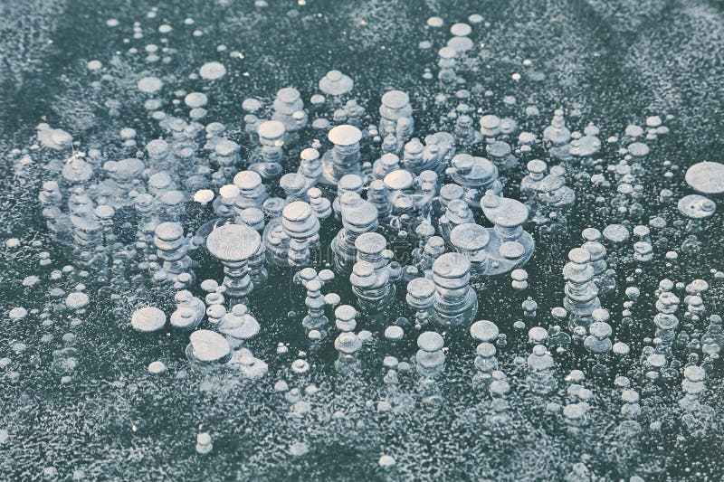 Winter Ice with Gas Bubbles Trapped Inside Stock Photo - Image of bank ...