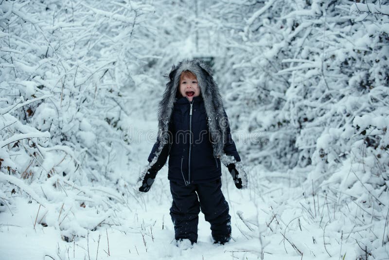 Winter Kid Posing and Having Fun. Winter Portrait of Cute Child in Snow ...