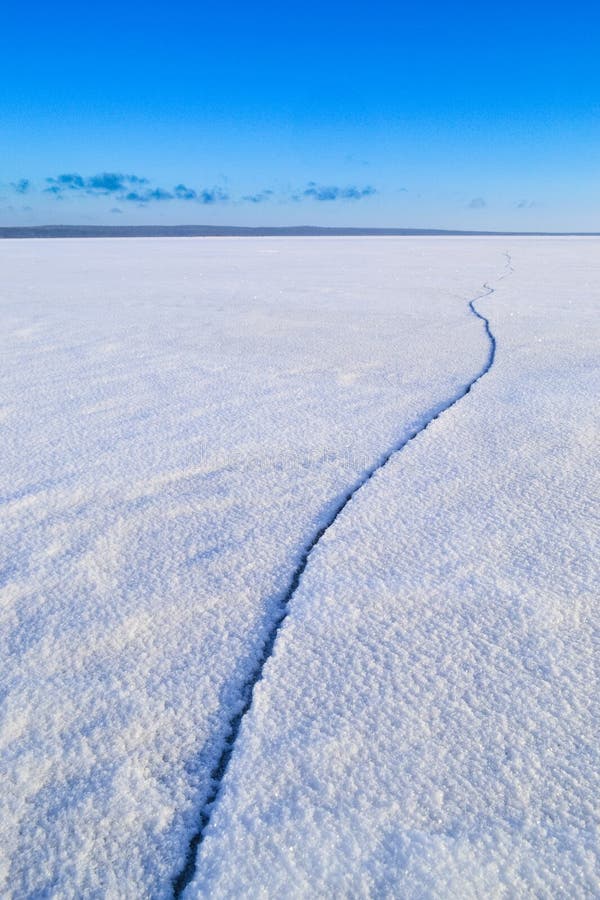 Winter Landscape with Cracked Ice on the Lake Stock Photo - Image of ...