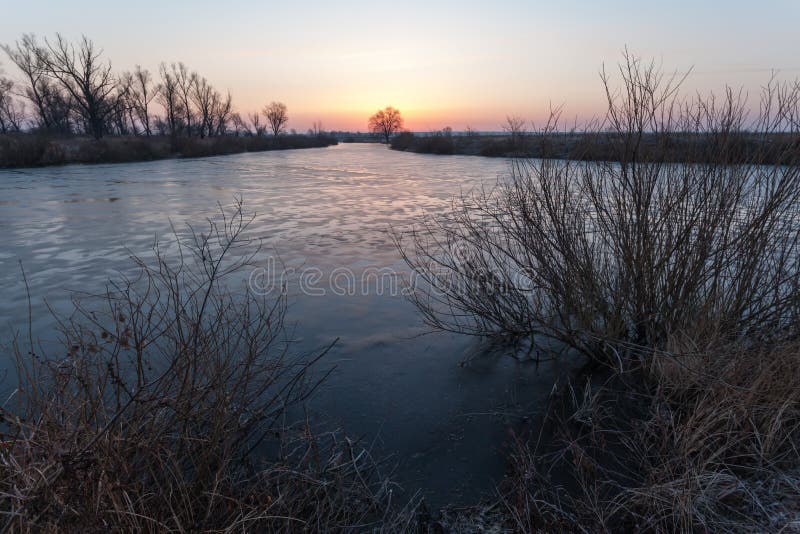 Landscape at Dawn - a Small River in the Fog with Trees and Bushes ...