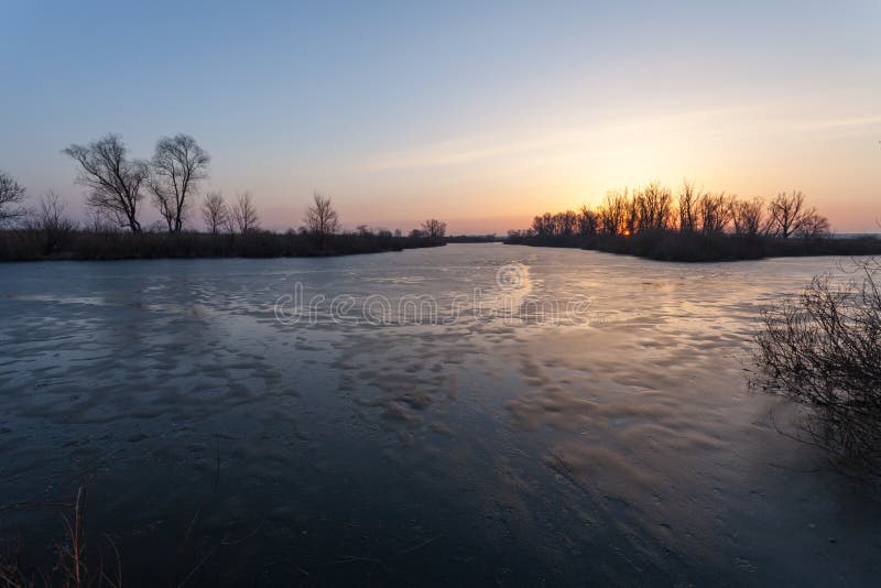 Landscape at Dawn - a Small River in the Fog with Trees and Bushes ...