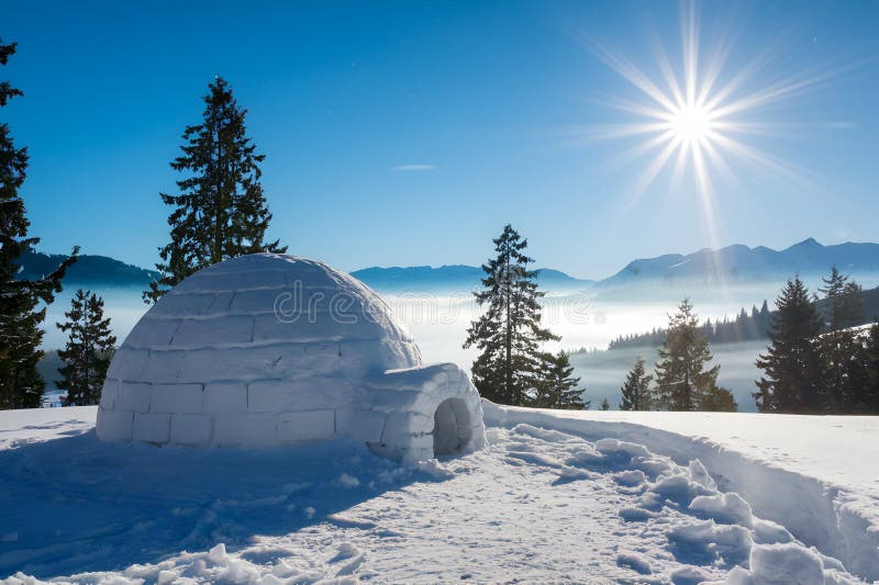 Winter Landscape Features Igloo, Snowy Ground, and Misty Mountains in ...
