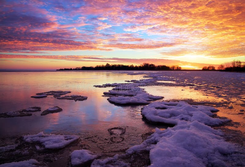 Icy lake at sunset stock image. Image of finland, tranquility - 3212301