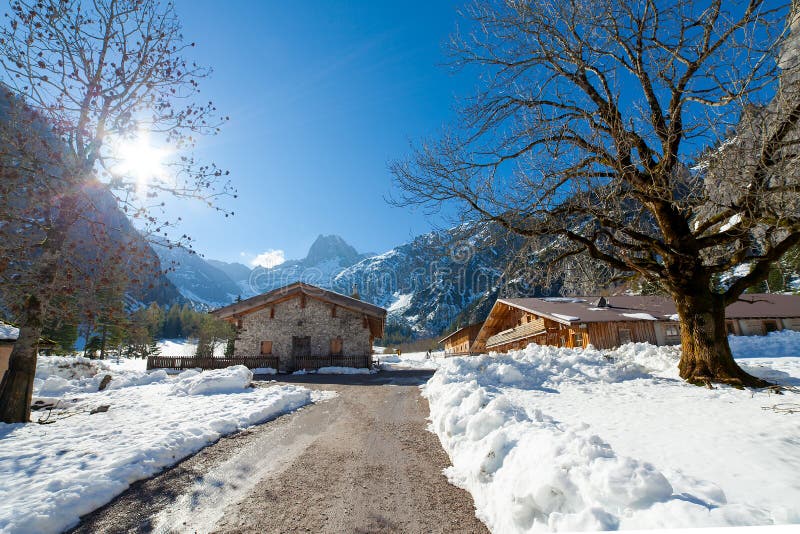 Winter Landscape in a Mountain Valley with Huts. Stock Photo - Image of ...