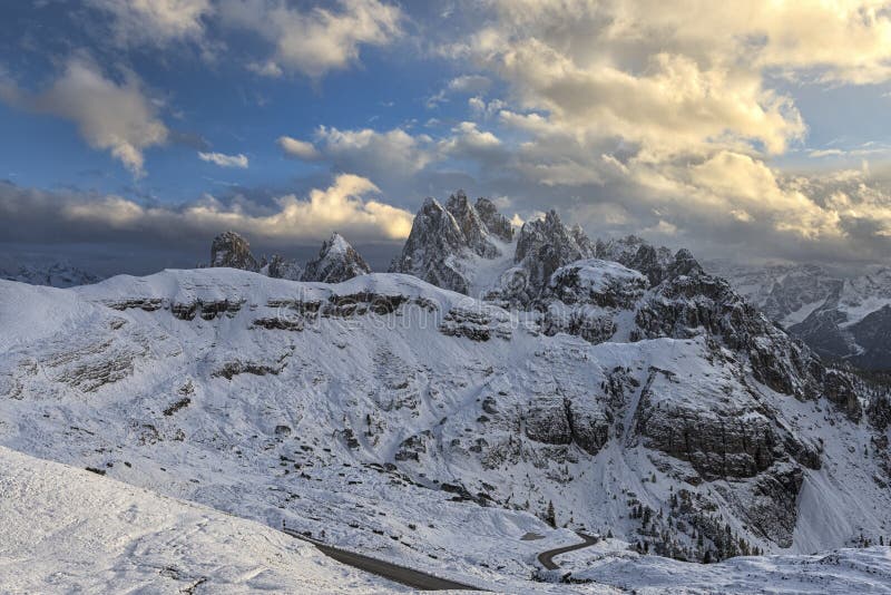 Winter Landscape Shot at Snowy Alps with Sharp Peaks and Cloudy Sky ...