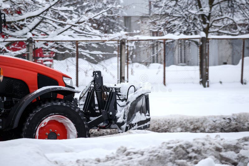 .Winter Landscape with Snow-clearing Red Tractor Stock Image - Image of ...