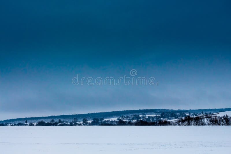 Winter Landscape with Snowy Field and Dark Blue Sky_ Stock Image ...