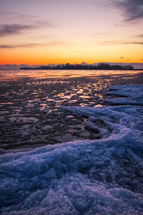Winter Landscape with Sunset Sky and Frozen River. Daybreak Stock Photo ...