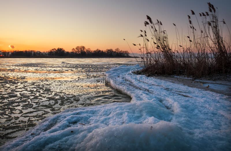 Winter Landscape with Sunset Sky and Frozen River. Daybreak Stock Photo ...
