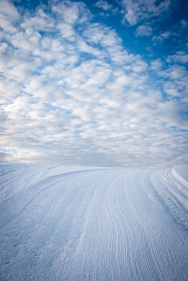 Winter Landscape. a Track Rolled by a Recreation Track Against the ...