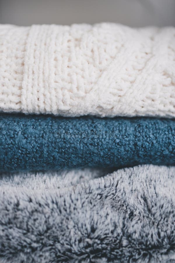 Winter Lifestyle Concept, Soft and Fluffy Blankets and Throws Stack ...