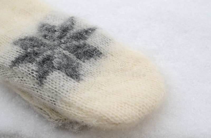 Winter Mitten on Snowy Surface Stock Photo - Image of fabric, personal ...