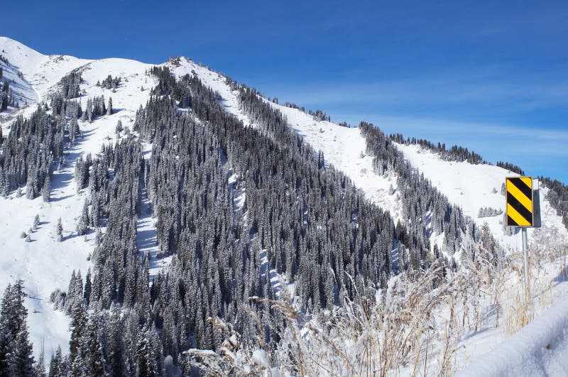 Winter Mountain And Road Sign Picture. Image: 1389321