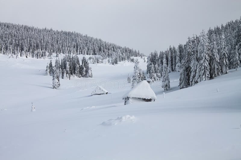 Winter in the Mountain with Small Huts Covered with Snow Stock Image ...