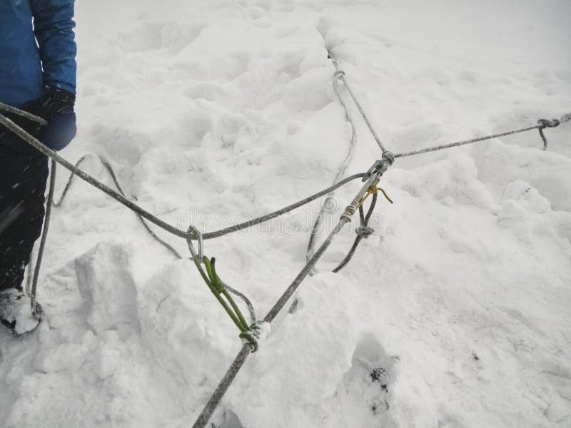 Winter Mountaineering: Close-up View of a Snow Anchor Stock Photo ...